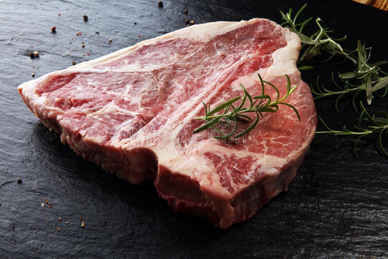 Raw T-bone Steak on Stone Cutting Board Stock Image - Image of ...