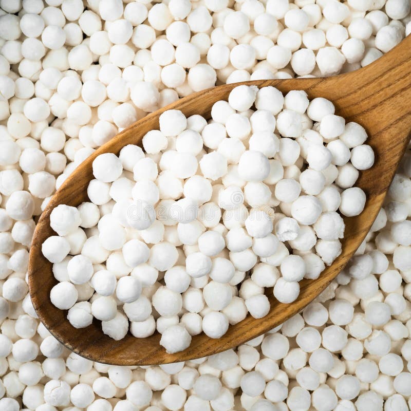 Raw Tapioca Pearls in Wooden Spoon Closeup Stock Image - Image of ...