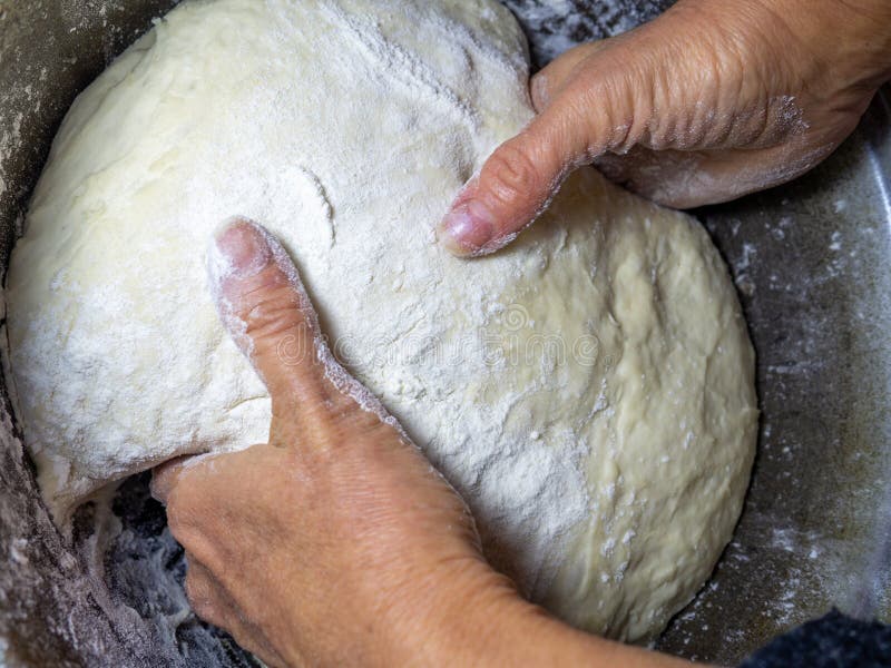 Raw Thick Dough in the Hands of a Woman Baker. Ready Dough for Baking ...