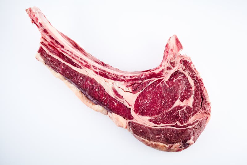 Raw Tomahawk Bone-in Rib Beef Steak on White Stock Photo - Image of ...