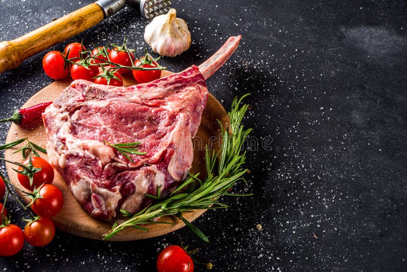 Raw tomahawk steak stock photo. Image of cooking, wooden - 197753318