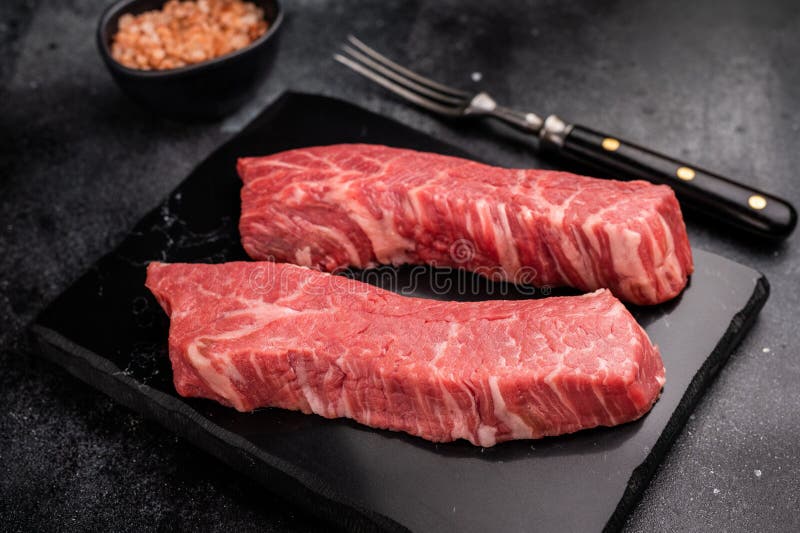 Raw Tri Tip Steak from Black Angus Beef Meat . Black Background Stock ...
