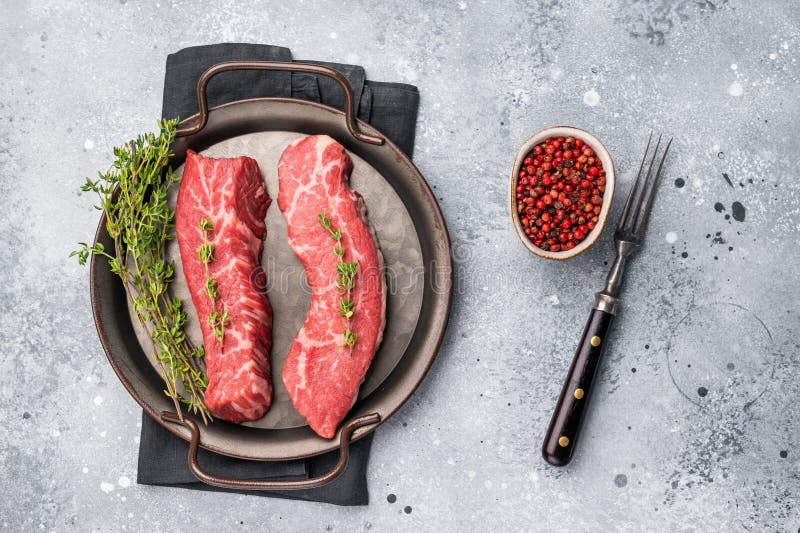 Raw Tri Tip Steak from Black Angus Beef Meat in Stell Tray. Grey ...