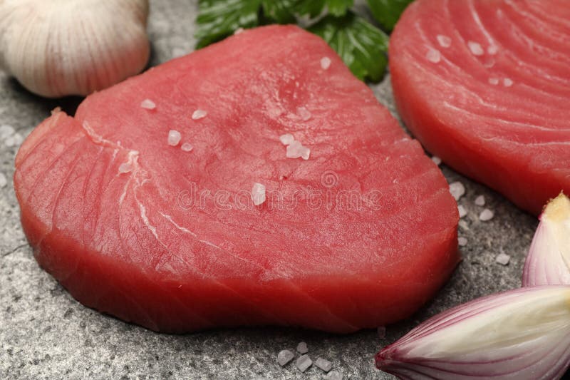 Raw Tuna Fillets with Rosemary on Plate, Closeup Stock Photo - Image of ...
