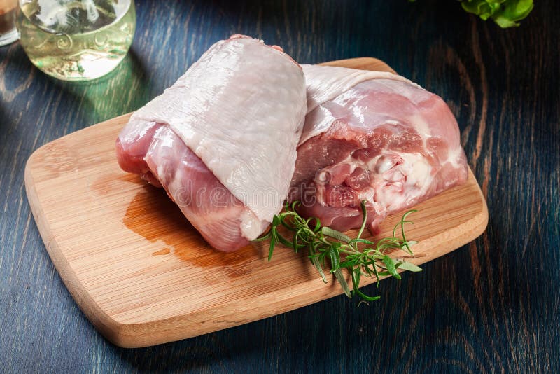 Raw Turkey Knuckle On Cutting Board Ready For Baking. Stock Photo ...