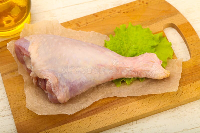 Raw turkey leg stock photo. Image of full, chopping - 114994512