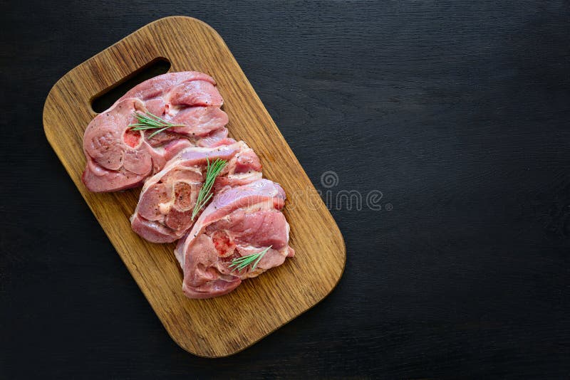 Raw Turkey Steak Meat with Bone on Wooden Board Background Stock Image ...