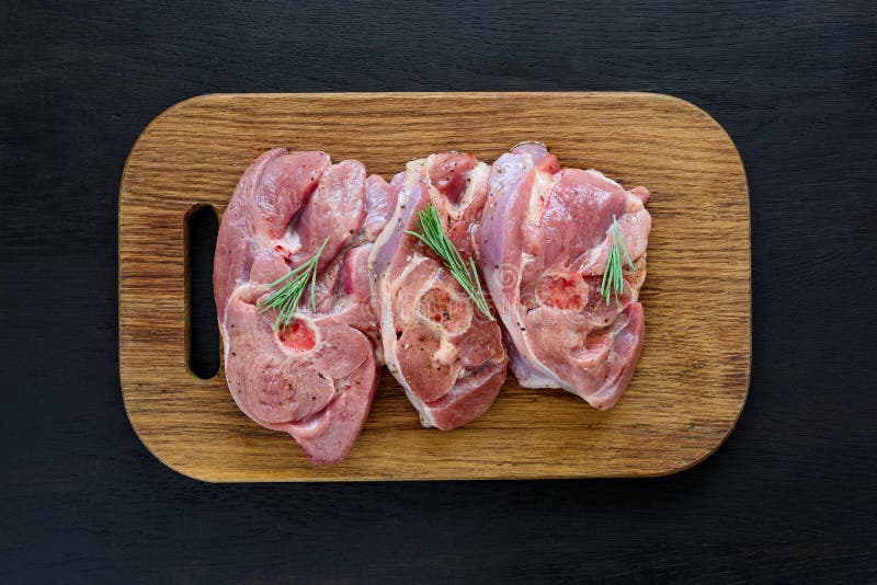 Raw Turkey Steak Meat with Bone on Wooden Board Background Stock Image ...
