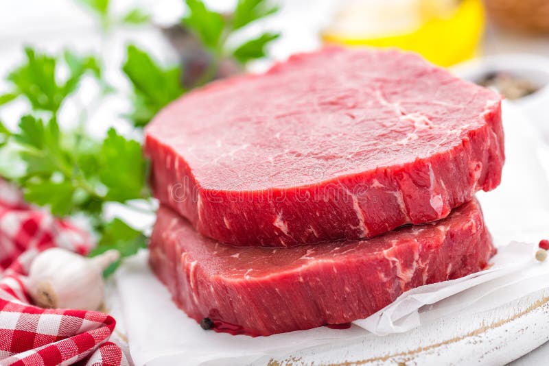 Raw, Uncooked Beef Meat Steaks on White Wooden Background Stock Photo ...