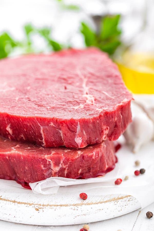 Raw, Uncooked Beef Meat Steaks on White Wooden Background Close-up ...