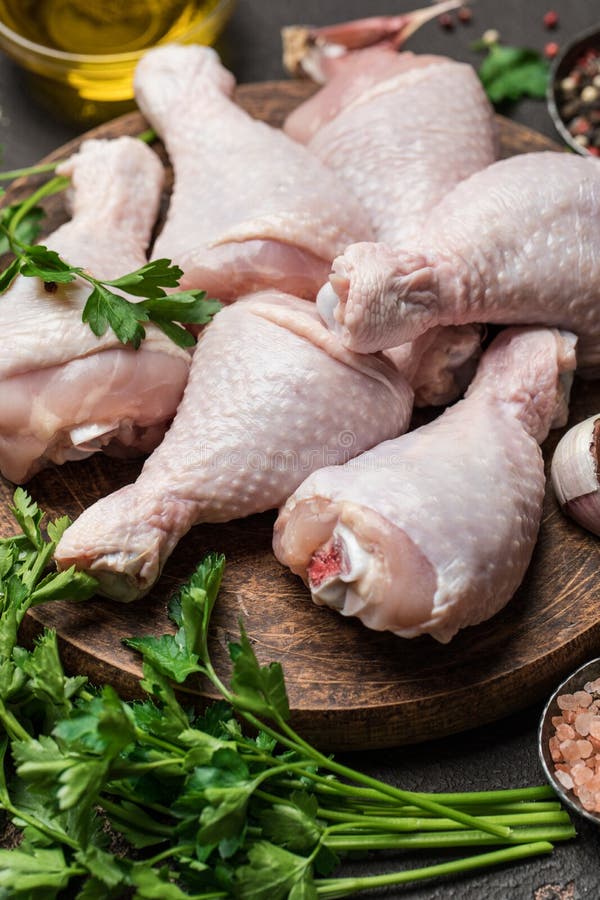 Raw Uncooked Chicken Legs with Spices and Ingredients for Cooking on ...