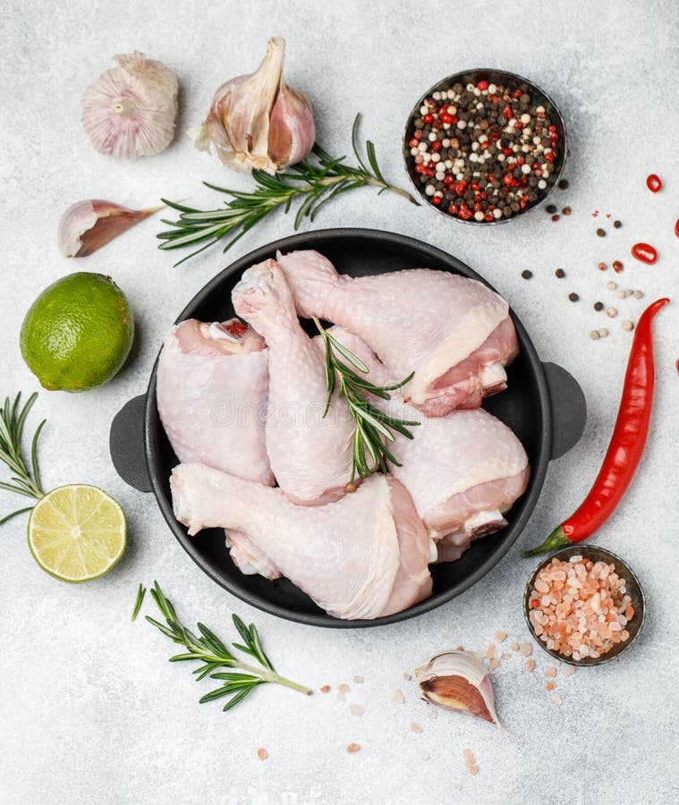 Raw Uncooked Chicken Legs with Spices and Ingredients for Cooking on ...