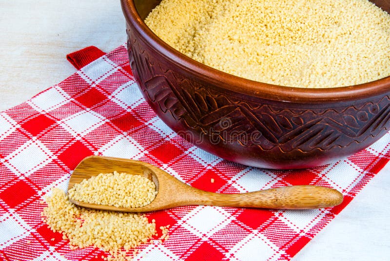 Raw uncooked couscous stock photo. Image of arabic, healthy - 76579574