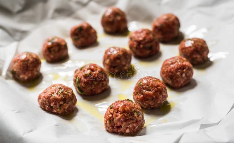 Raw Meatballs on Baking Sheet Stock Photo - Image of bowl, food: 15378326
