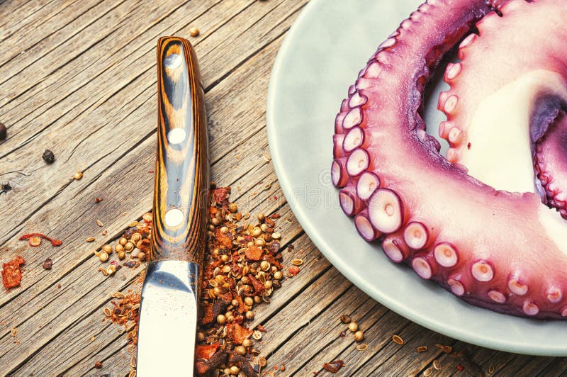 Raw Uncooked Octopus on Wooden Table Stock Image - Image of shellfish ...