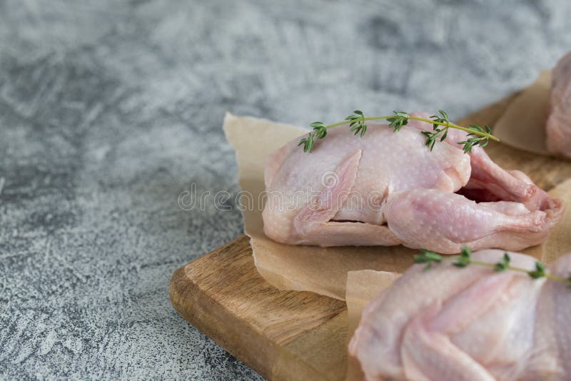 Raw Uncooked Quail. Raw Meat Quails Ready for Cooking on a Cutting ...
