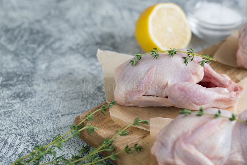 Raw Uncooked Quail. Raw Meat Quails Ready for Cooking on a Cutting ...
