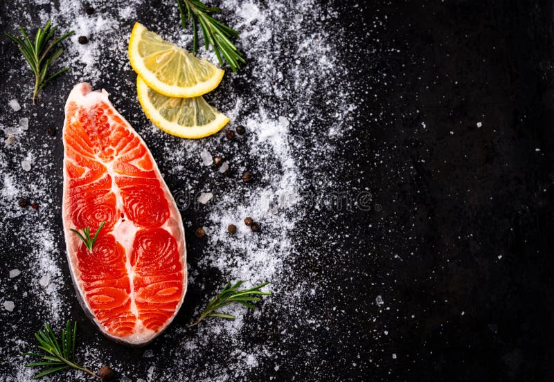 Raw Uncooked Salmon with Rosemary Stock Photo - Image of fillet, fish ...