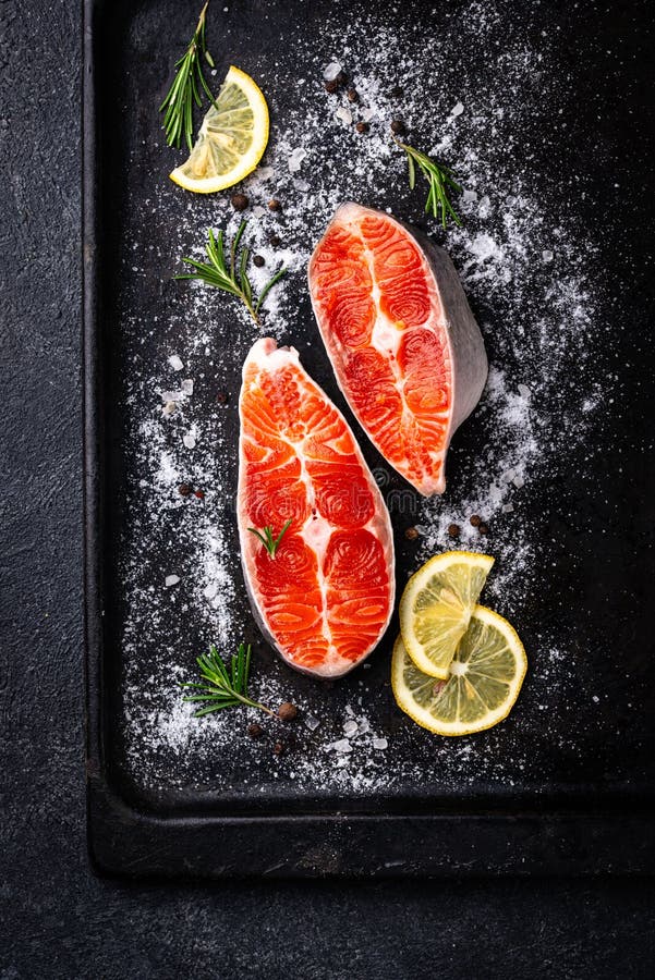 Raw Uncooked Salmon with Rosemary Stock Photo - Image of fillet, cook ...