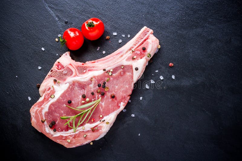 Raw Veal Cutlet at Black Slate Plate Stock Image - Image of ingredient ...