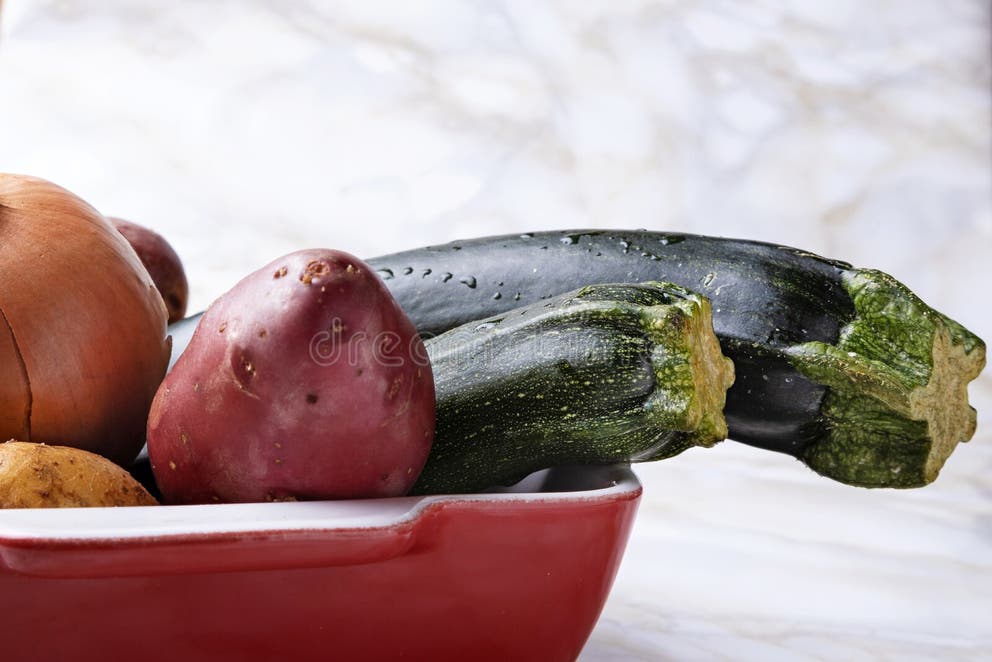Raw Vegetables Presented in an Earthenware Dish before Preparation ...
