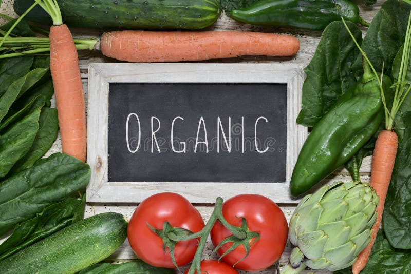 Raw Vegetables and Text Organic on a Chalkboard Stock Image - Image of ...