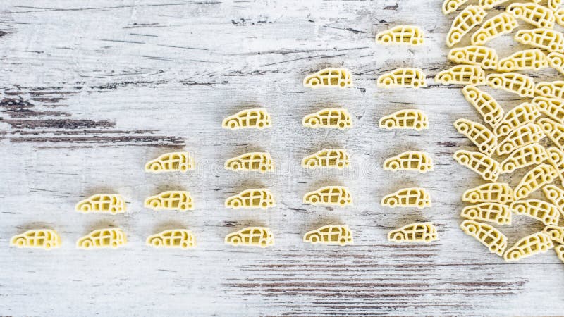 Raw Vehicle-shaped Pasta in Pile on Wooden Table Stock Image - Image of ...
