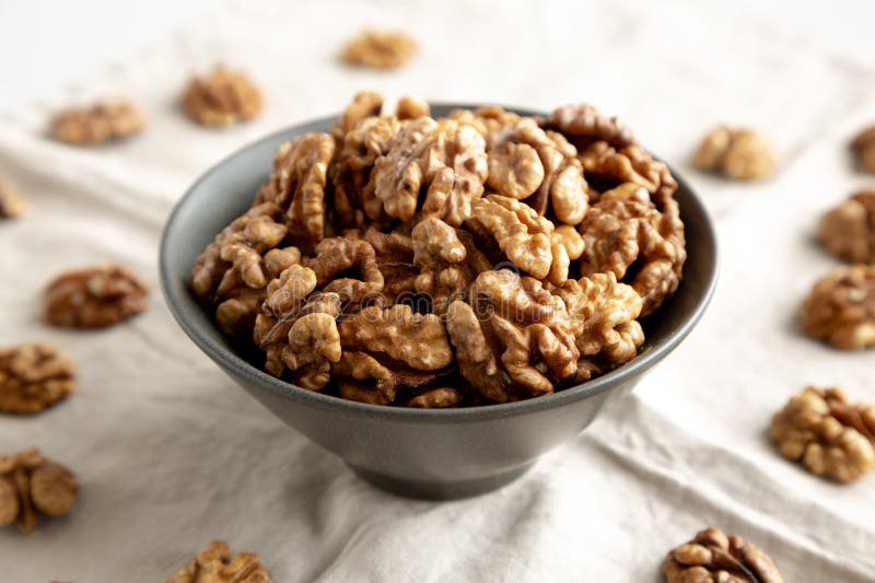 Raw Walnut Halfs in a Bowl, Side View. Close-up Stock Image - Image of ...