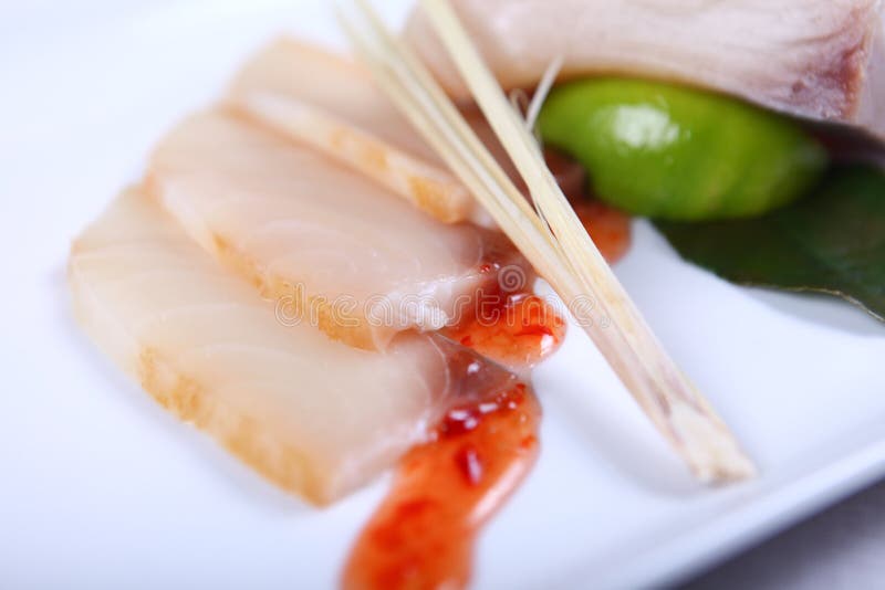 Raw white fish with sauce stock image. Image of decorate - 23902553