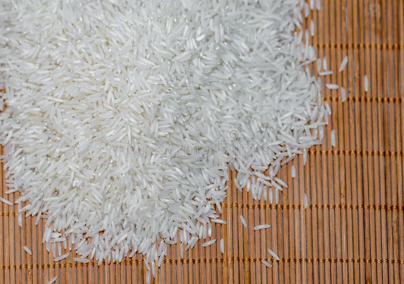 Raw White Rice on the Wooden Mat Stock Photo - Image of isolated, long ...