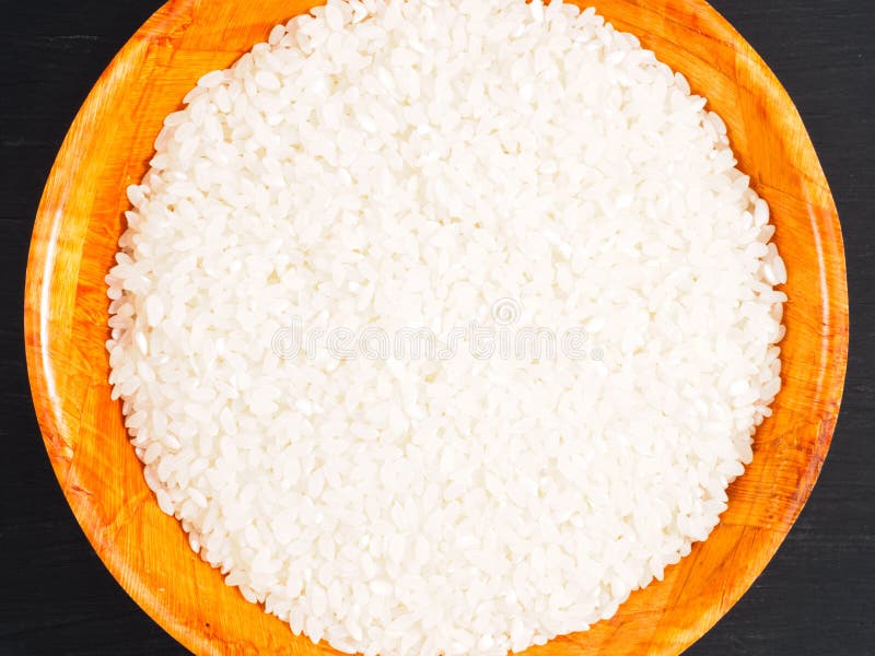 Raw White Round Grain Rice in a Bamboo Bowl Stock Image - Image of ...
