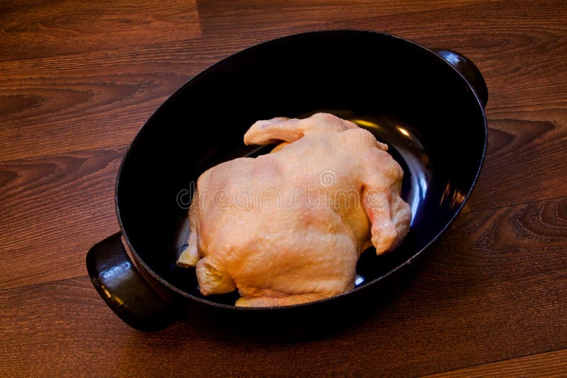 Raw Chicken Being Prepared for a Sunday Roast Stock Photo - Image of ...