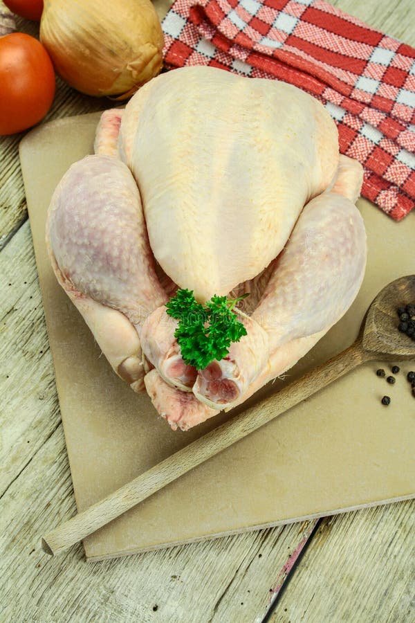 Raw whole chicken stock photo. Image of table, meat - 169731220