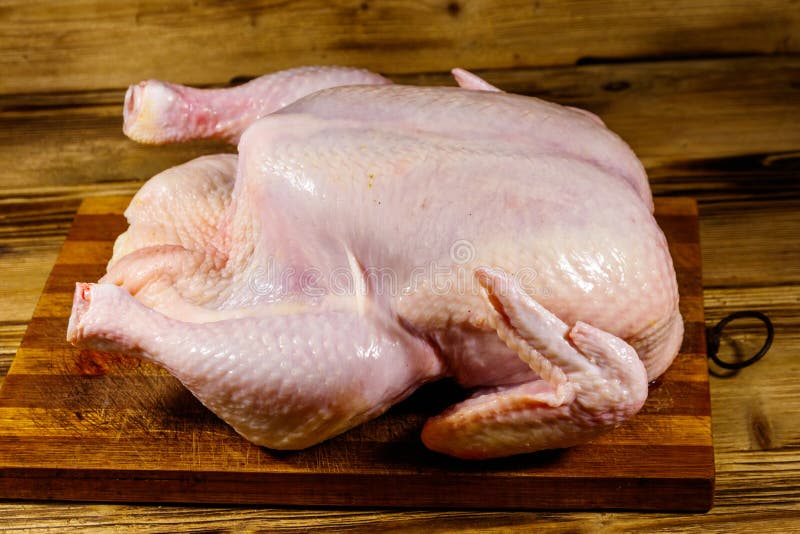 Raw Whole Chicken on Wooden Table Stock Photo - Image of ingredient ...