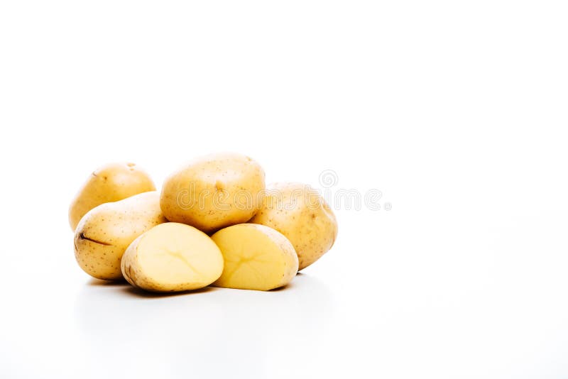 Raw Whole and Cut Fresh Potatoes Isolated on White. Stock Photo - Image ...