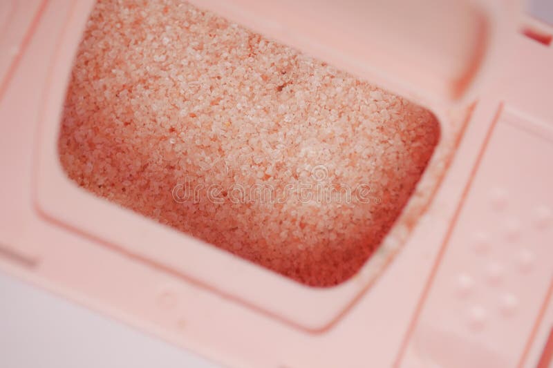 Raw Whole Dried Pink Himalayan Salt in a Container on White Stock Image ...