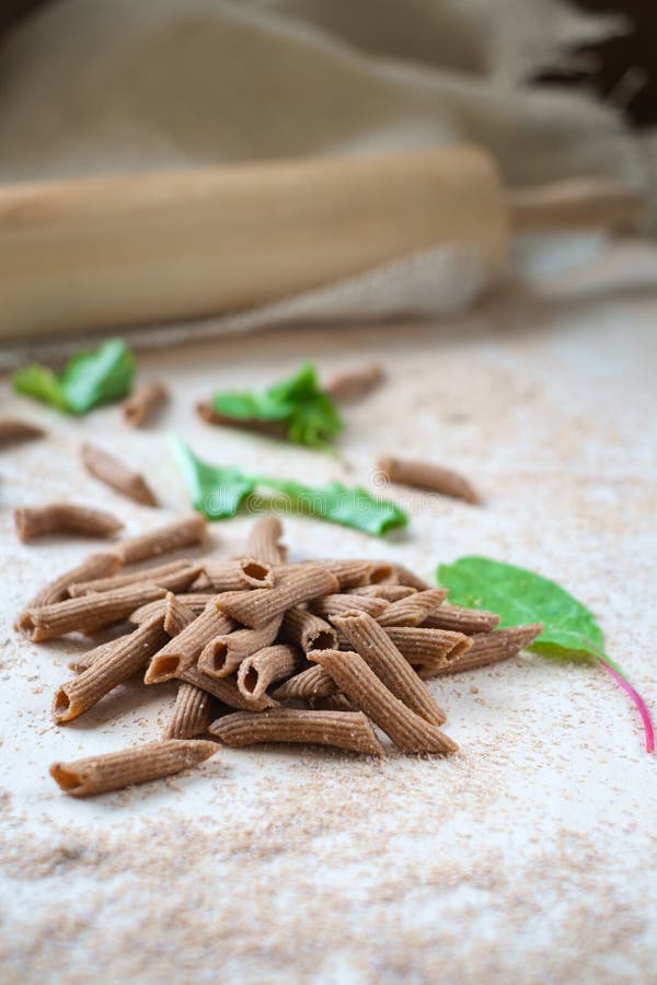 Raw Whole Grain Penne Pasta Homemade Stock Image - Image of eating ...