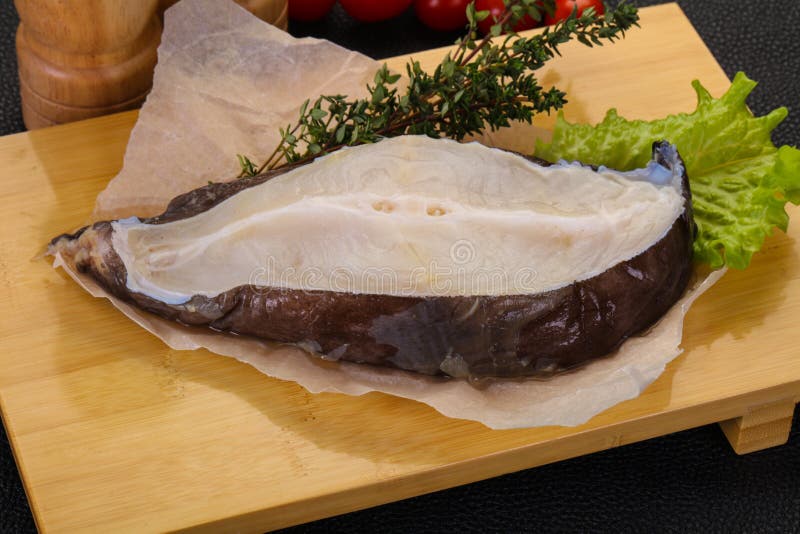 Raw wolffish steak stock photo. Image of portion, food - 182740540