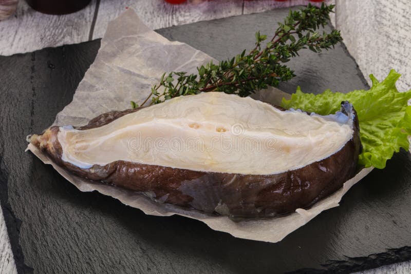 Raw wolffish steak stock photo. Image of wolf, slice - 196629280