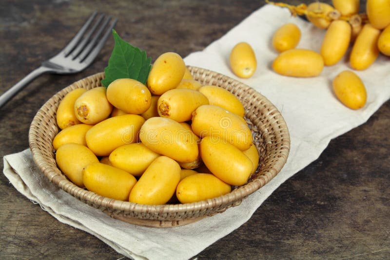 Raw Yellow Date Palm or Dates Stock Photo - Image of dessert, ripe ...