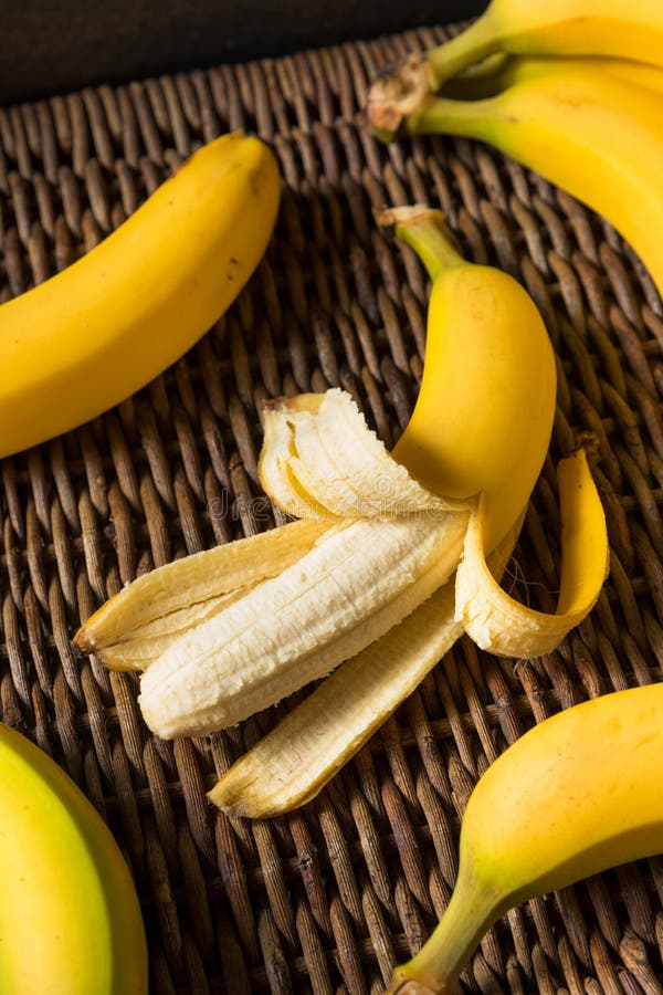 Raw Yellow Organic Bananas stock photo. Image of food - 190354792
