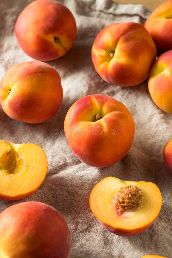 Raw Yellow Organic Peaches stock photo. Image of yellow - 155239250
