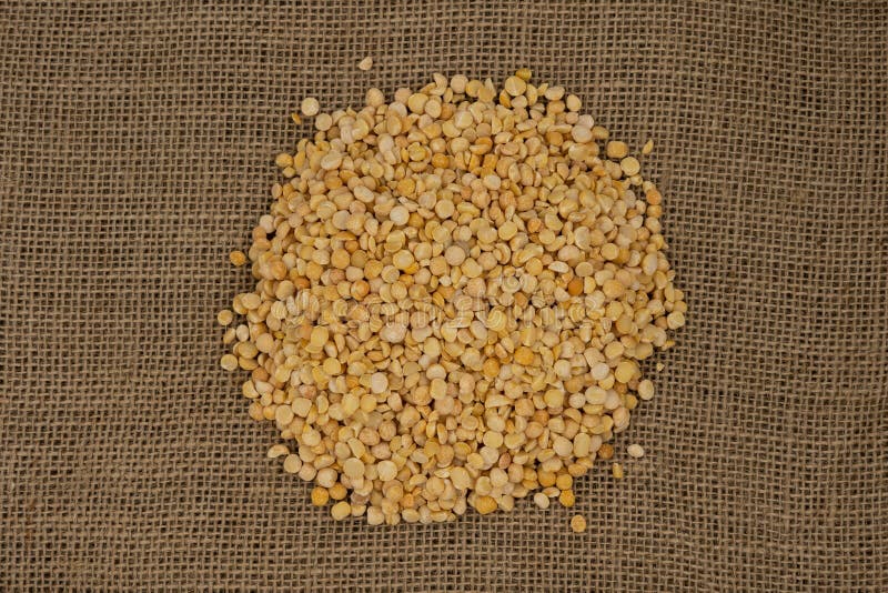 Raw Yellow Split Peas on Burlap Texture Background Stock Image - Image ...