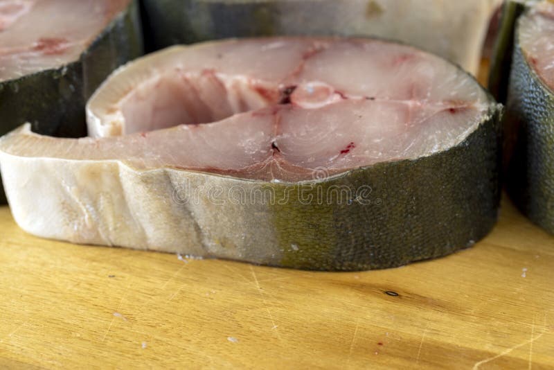 Raw Yellow-tailed Fish during Cutting for Cooking Stock Image - Image ...