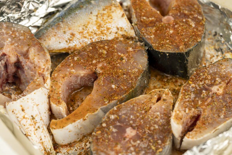 Raw Yellow-tailed Fish during Cutting for Cooking Stock Image - Image ...