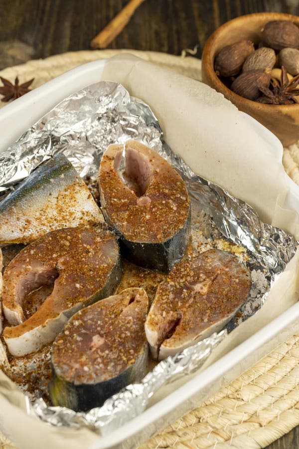 Raw Yellow-tailed Fish during Cutting for Cooking Stock Image - Image ...