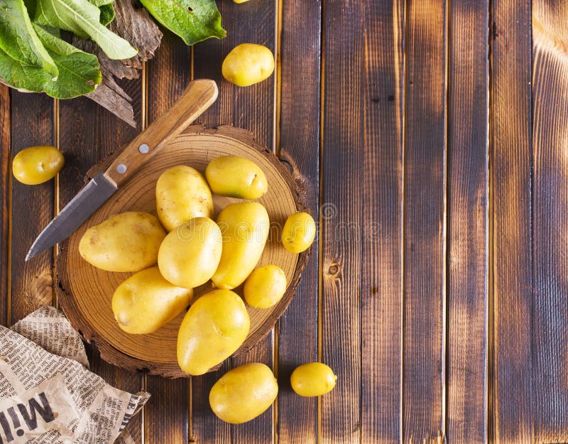 Raw Young Potatoes on a Table Stock Image - Image of table, nutrition ...