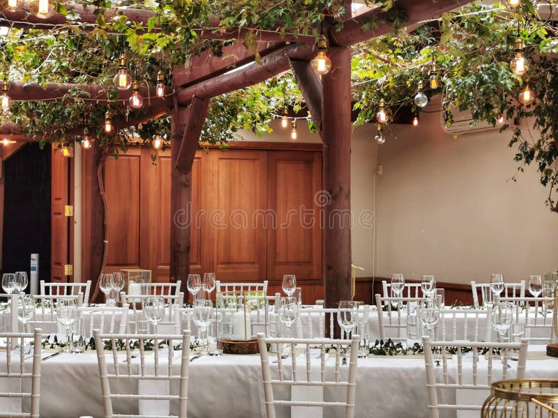 Raws of White Chairs and Tables at a Celebration Hall Stock Photo ...