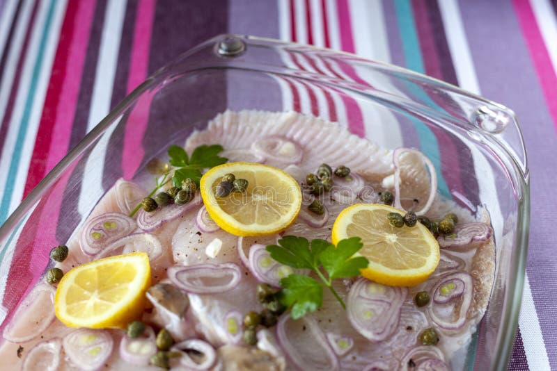 Ray Fish Wings Ready To Cook with Capers, Shallot and Lemons Stock ...