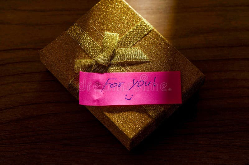 A Ray of Light Illuminates the Note for You on the Gift Box. Stock ...